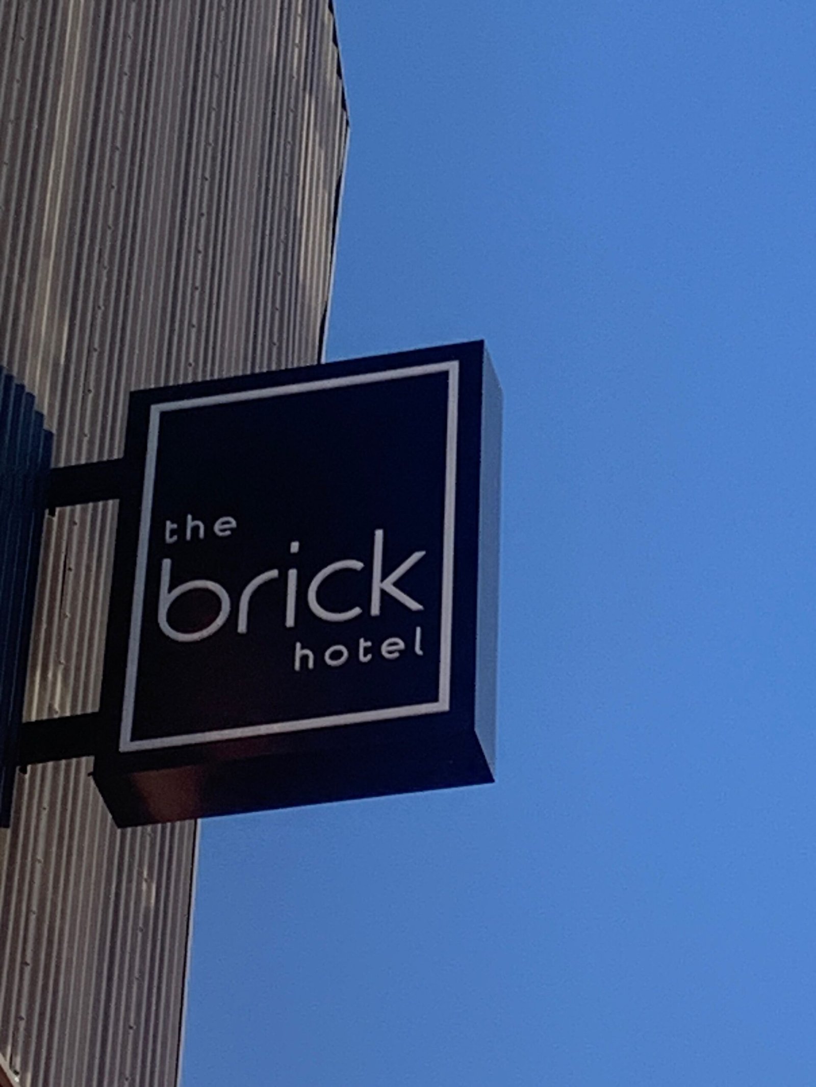 Blade Sign Brick Hotel - Signs For San Diego